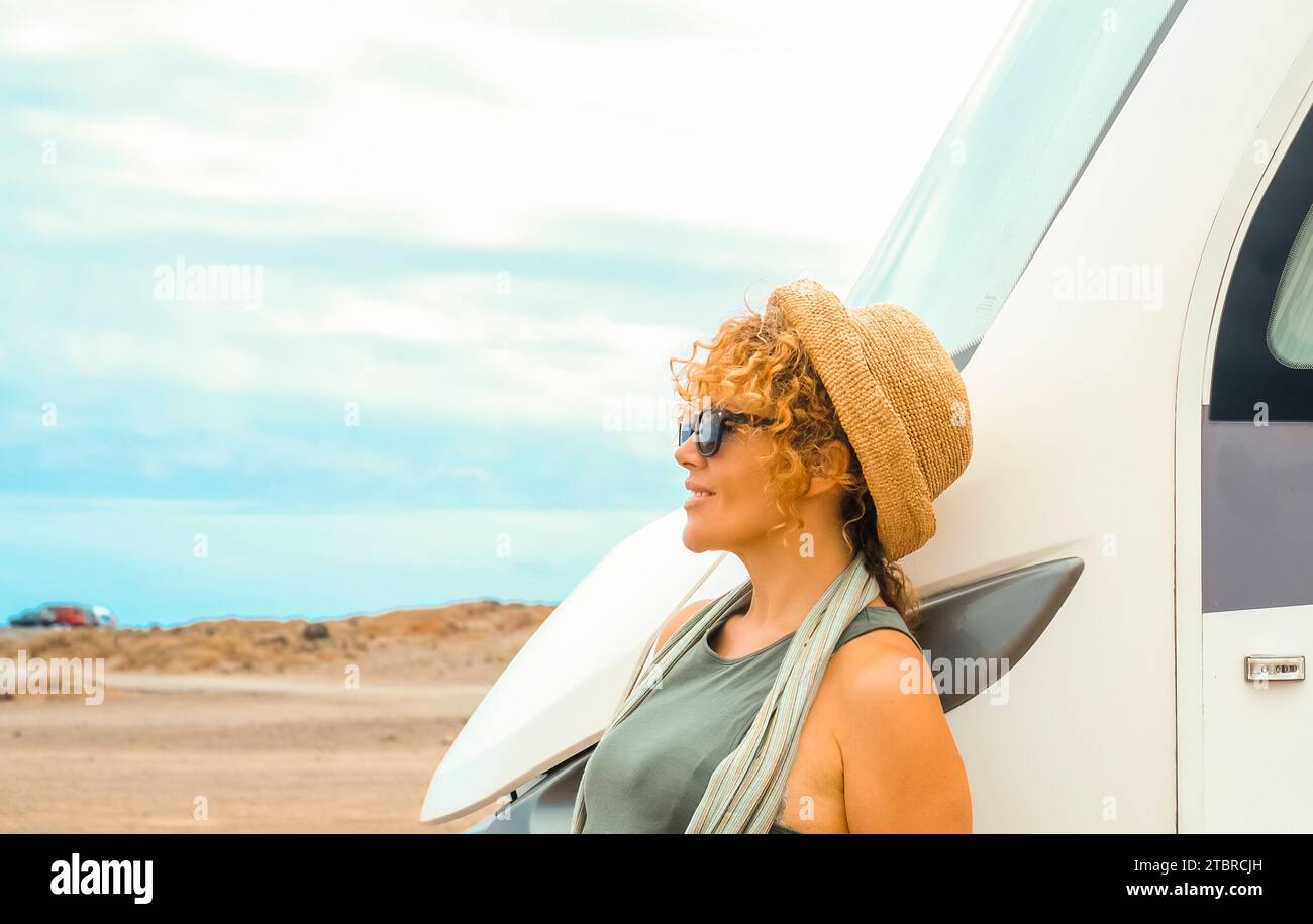 One solo traveler woman enjoy arrival destination standing outside a ...