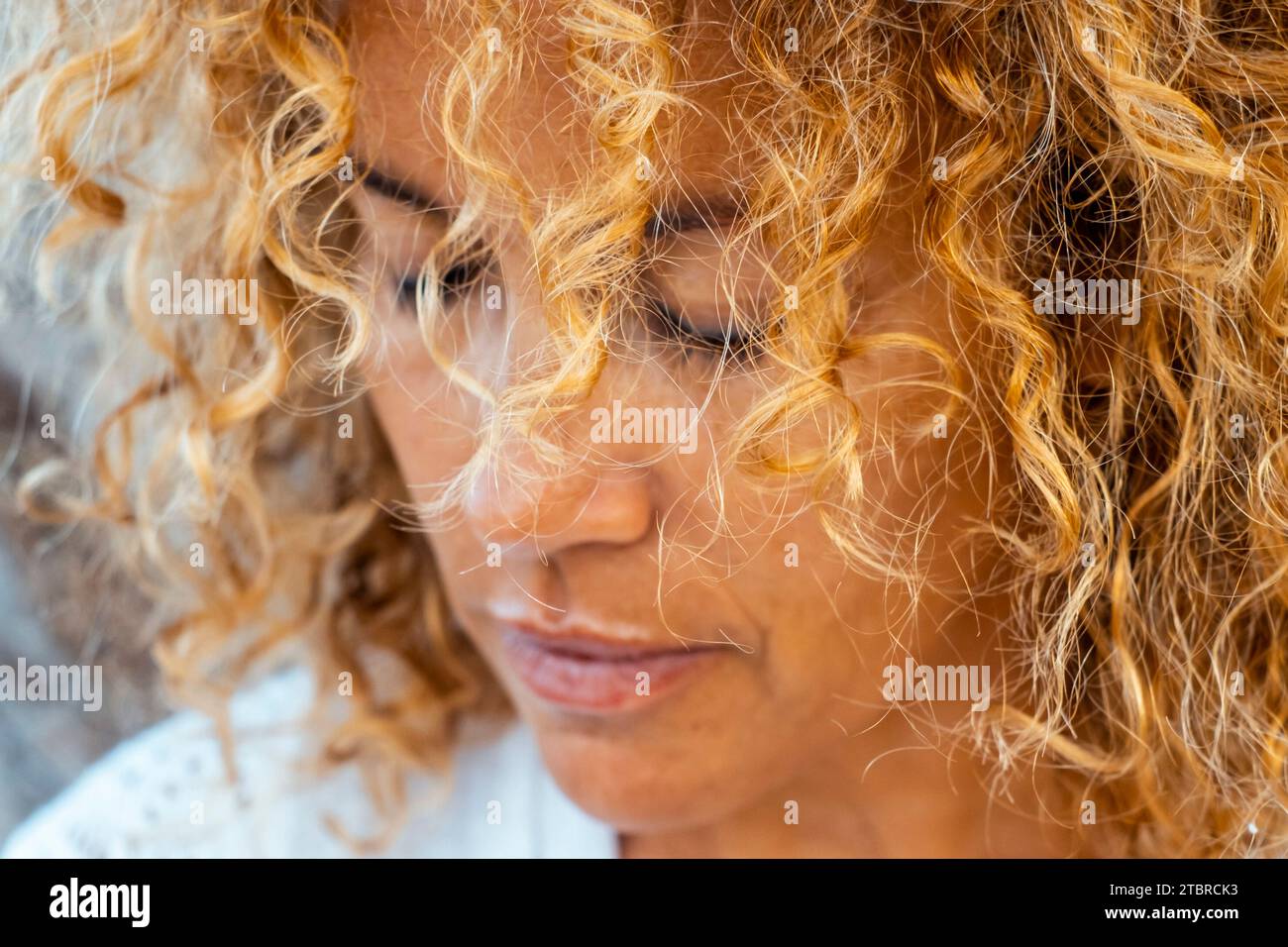 Curly tired sad middle hi-res stock photography and images - Alamy