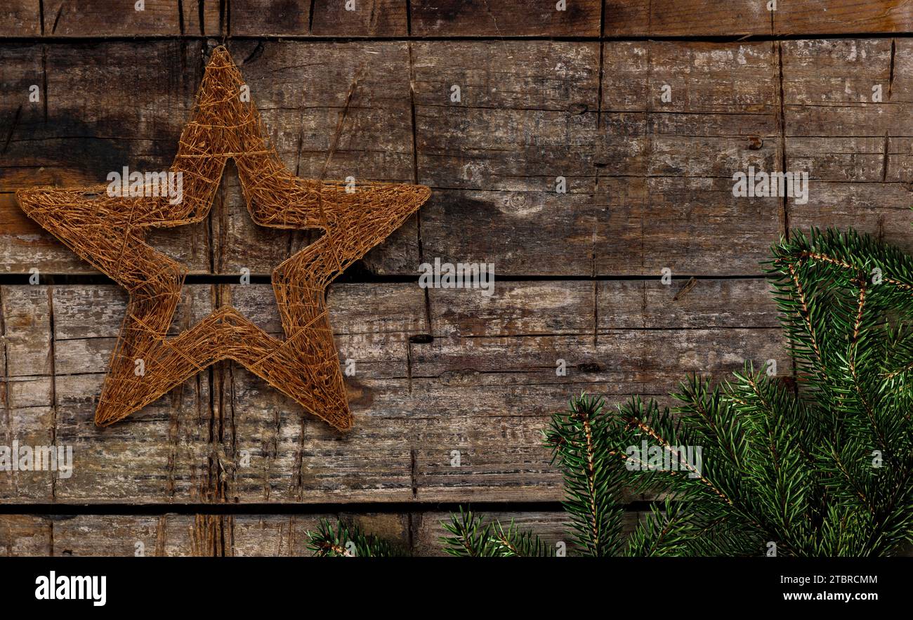 Rustic wooden Christmas background with fir branches and star Stock ...