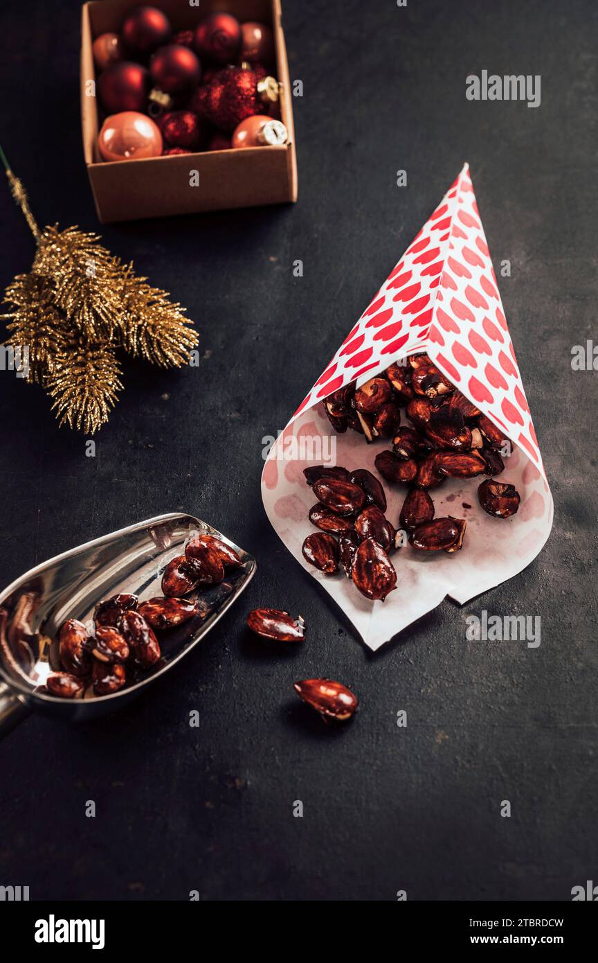 Caramelized, roasted, candied cinnamon almonds, typical german treat on ...