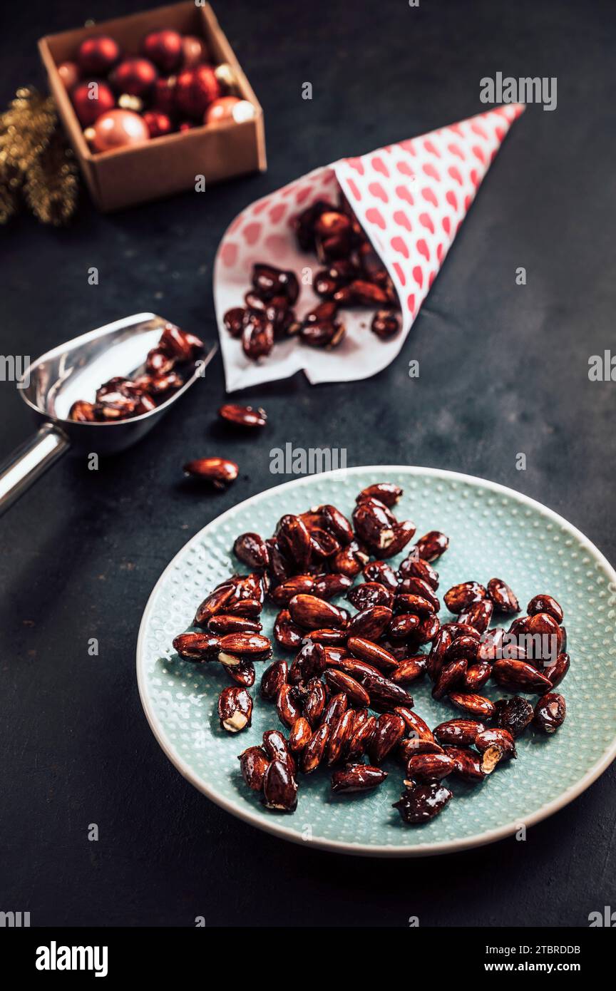 Caramelized, roasted, candied cinnamon almonds, typical german treat on ...