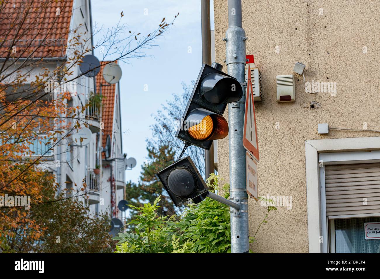 Broken traffic light, symbolic image for the divided traffic light ...