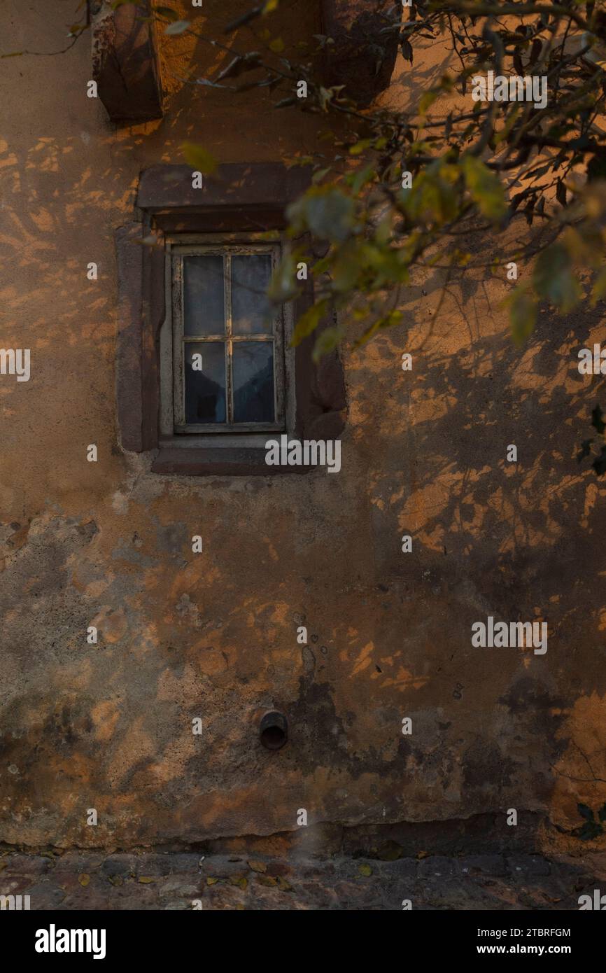 Old fashioned shadow covered window in Riquewihr, France, Alsace Stock ...