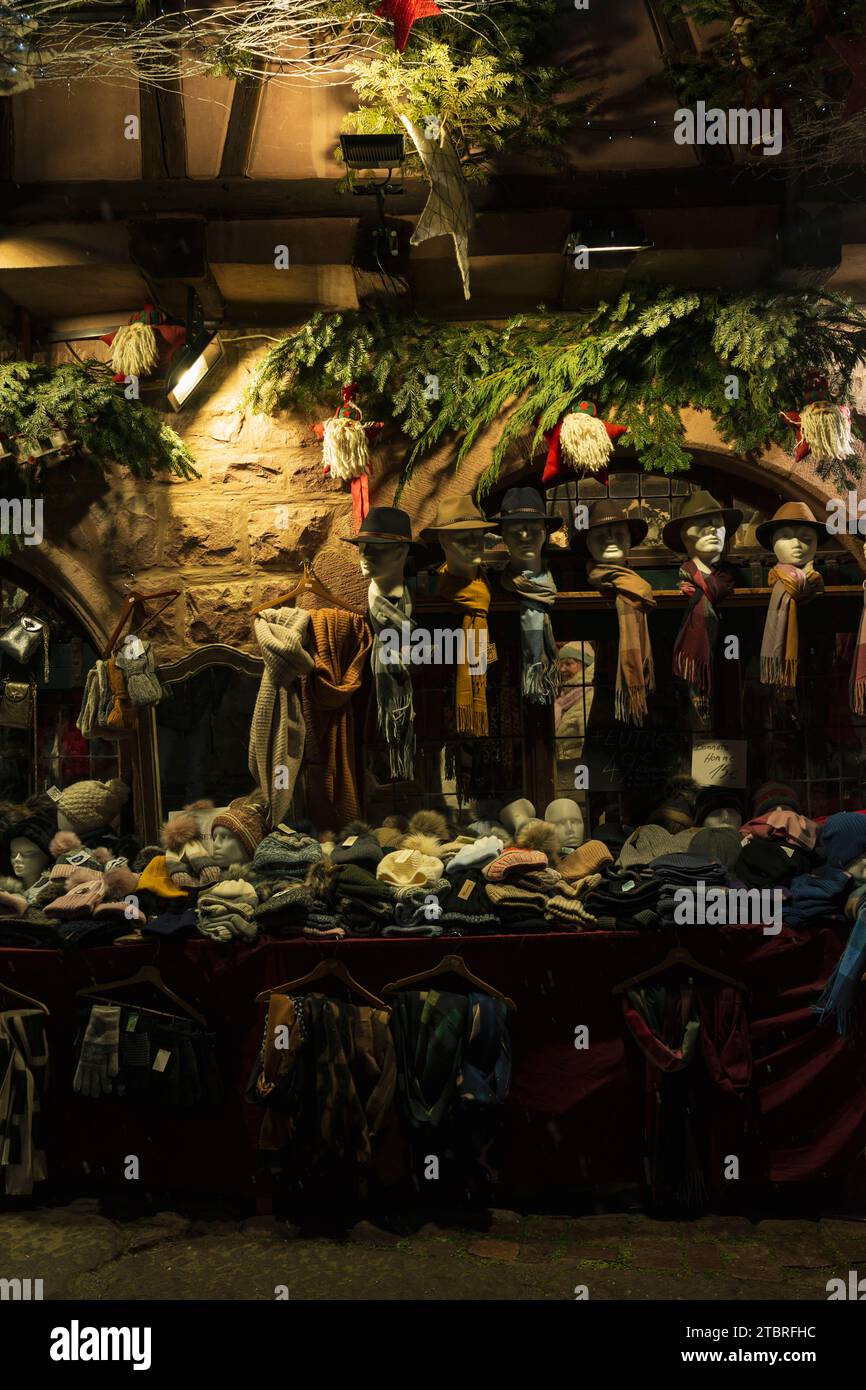 Decorated clothes stall in Riquewihr, France, Alsace Stock Photo - Alamy