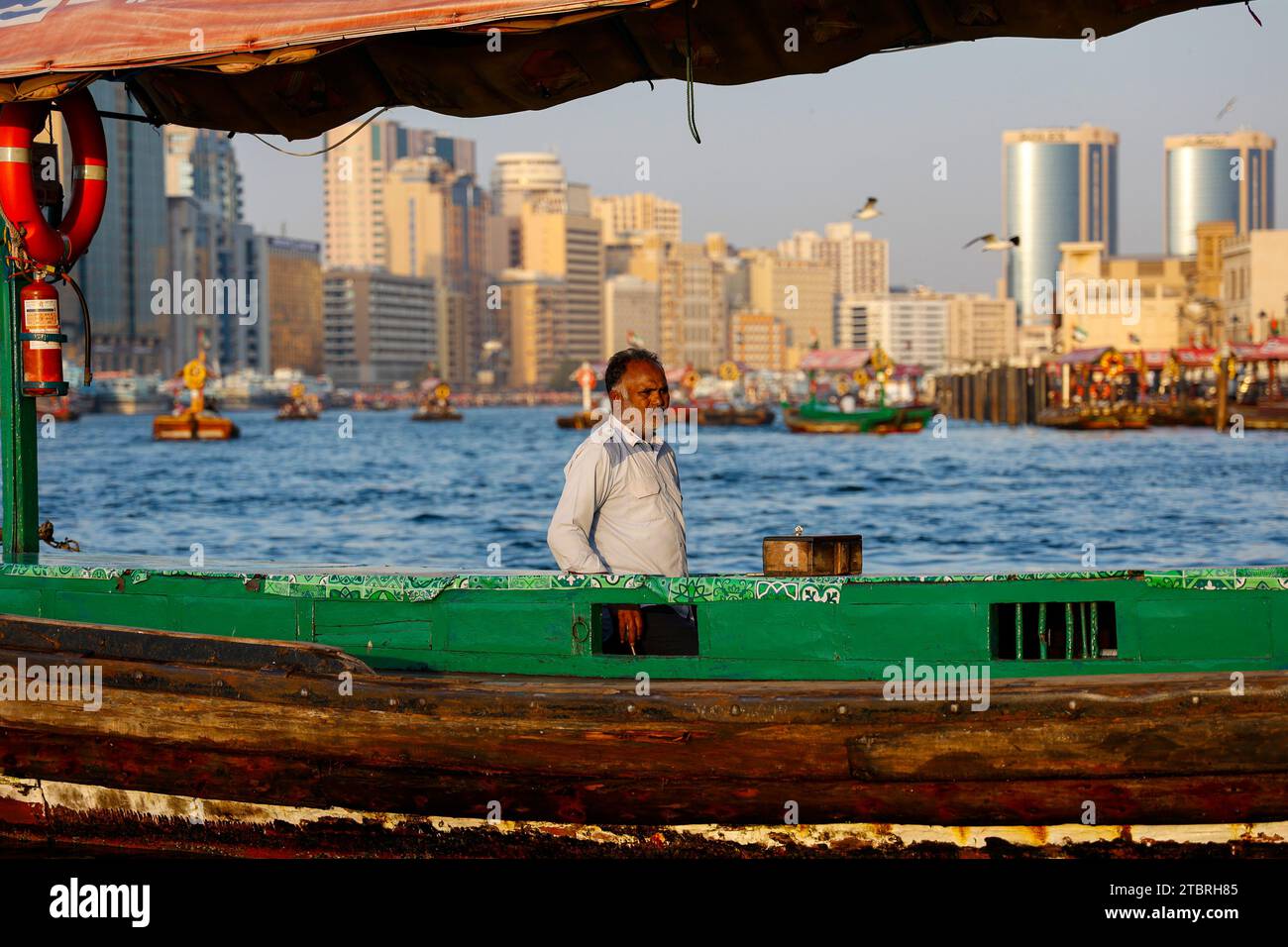 Watertaxi (abra) crossing Dubai Creek, Dubai, UAE Stock Photo - Alamy