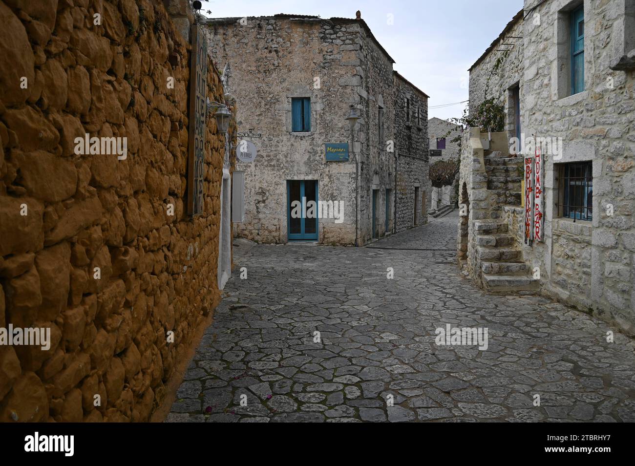 Landscape with scenic view of antique stone buildings and local shops ...