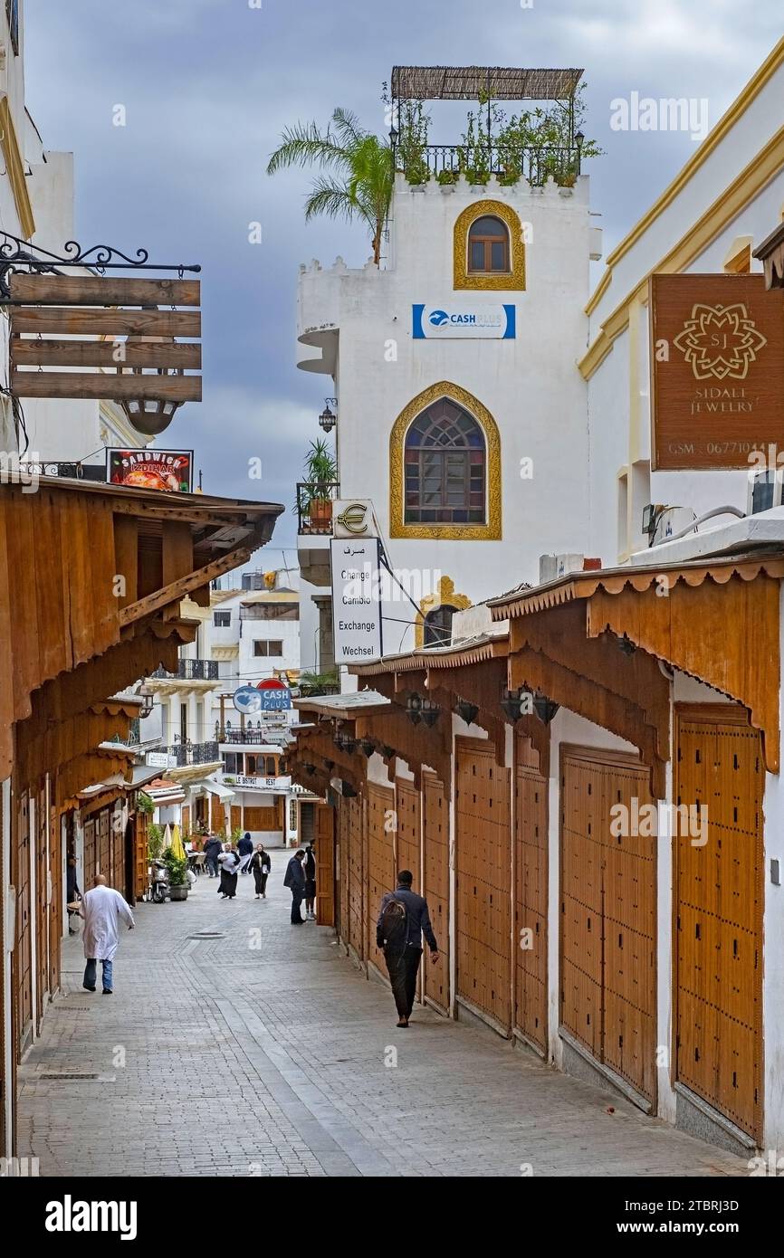 Wooden shutters of closed shops in shopping street on Friday in medina ...