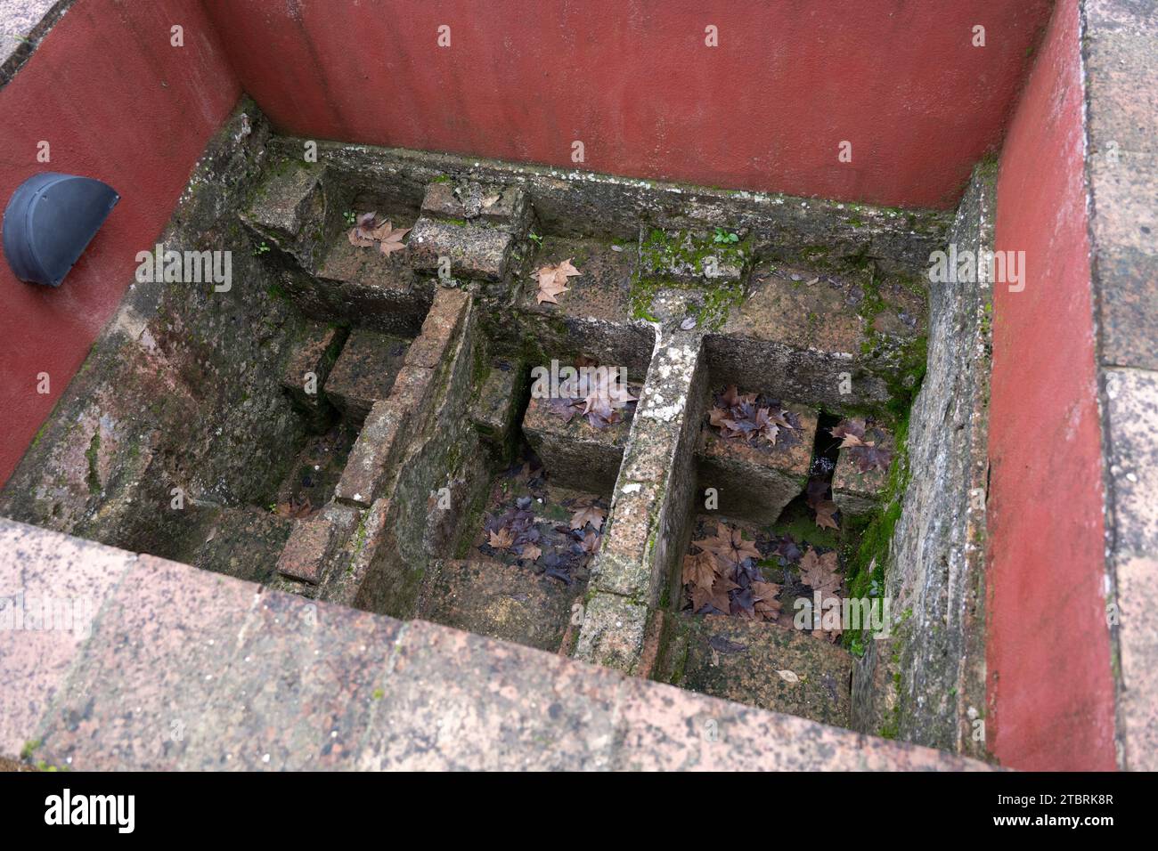 Ancient brick arches and columns in a historic building with unique ...