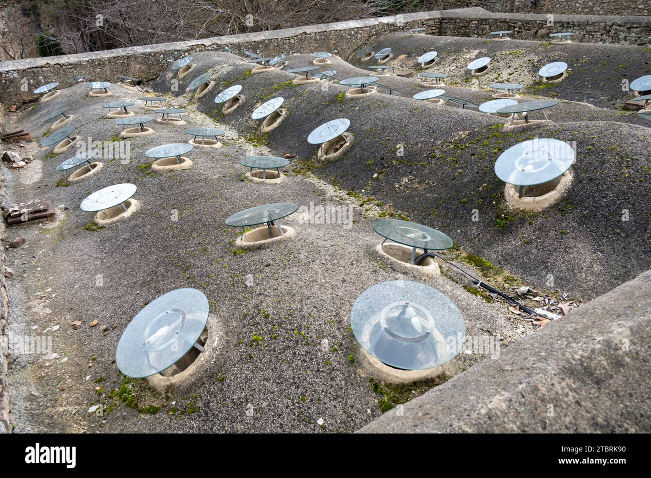 Ancient brick arches and columns in a historic building with unique ...