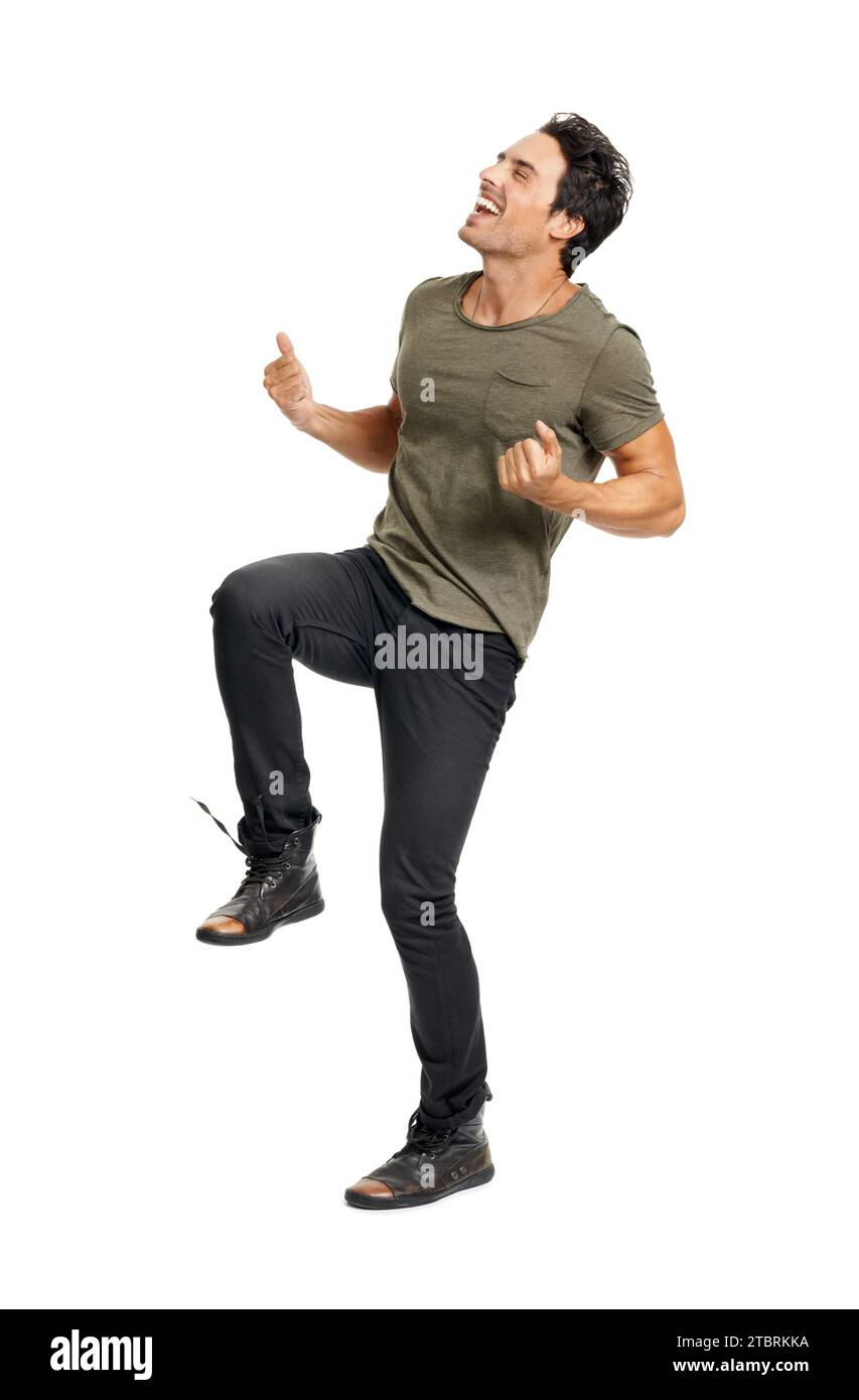 Man, happy and jumping for celebration, excited and energy by white ...