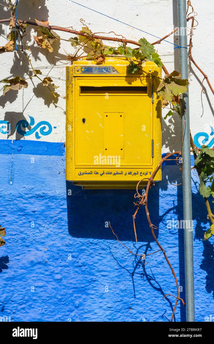 Chefchaouen, Morocco. October 14th, 2022 - Moroccan yellow post box ...