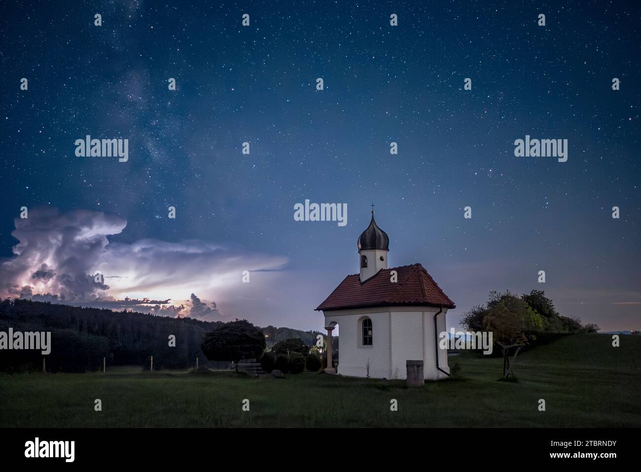 Night sky with Milky Way over a chapel in Upper Bavaria, Bavaria ...