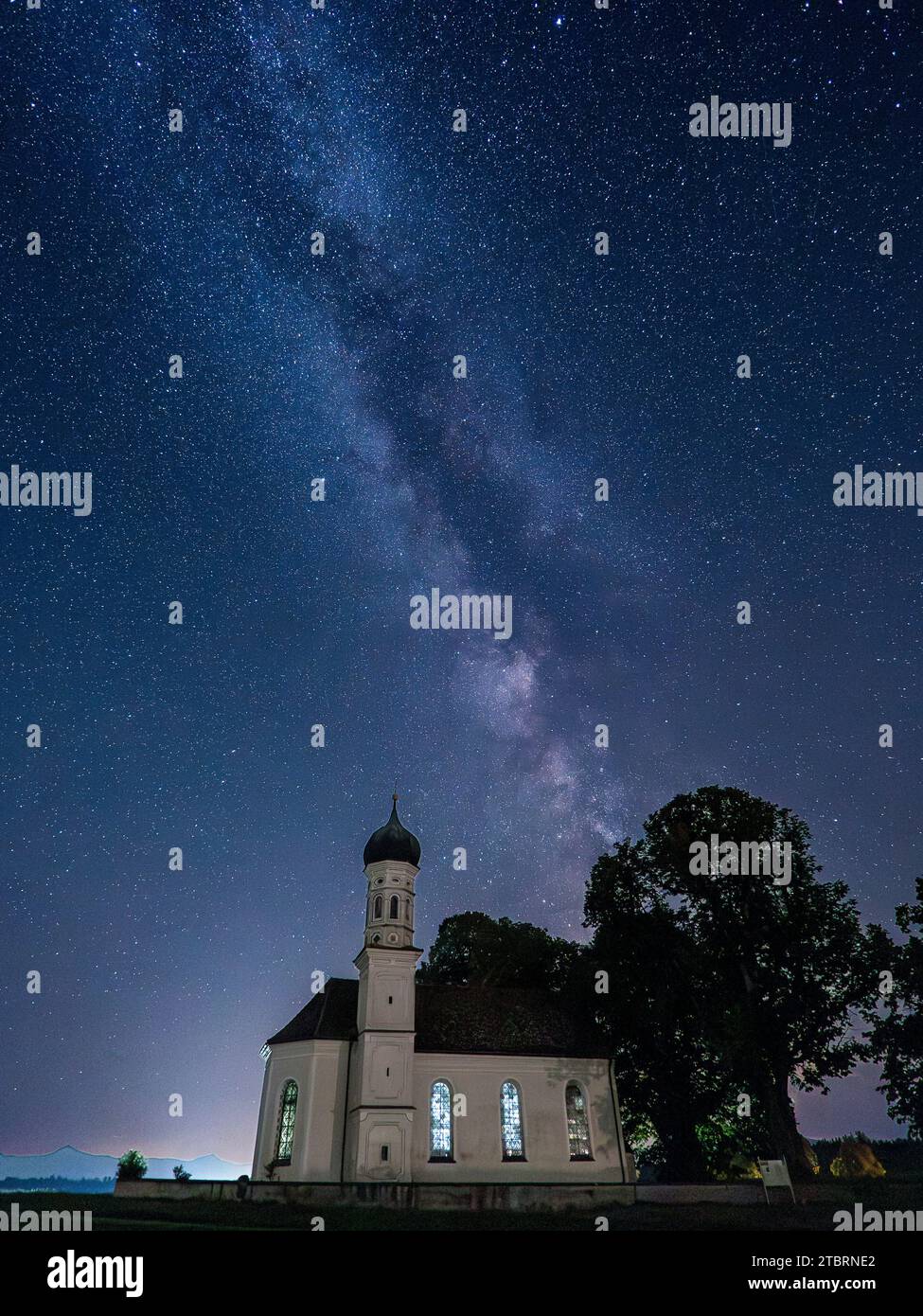 Night sky with Milky Way over Church of St. Andrä in Upper Bavaria ...