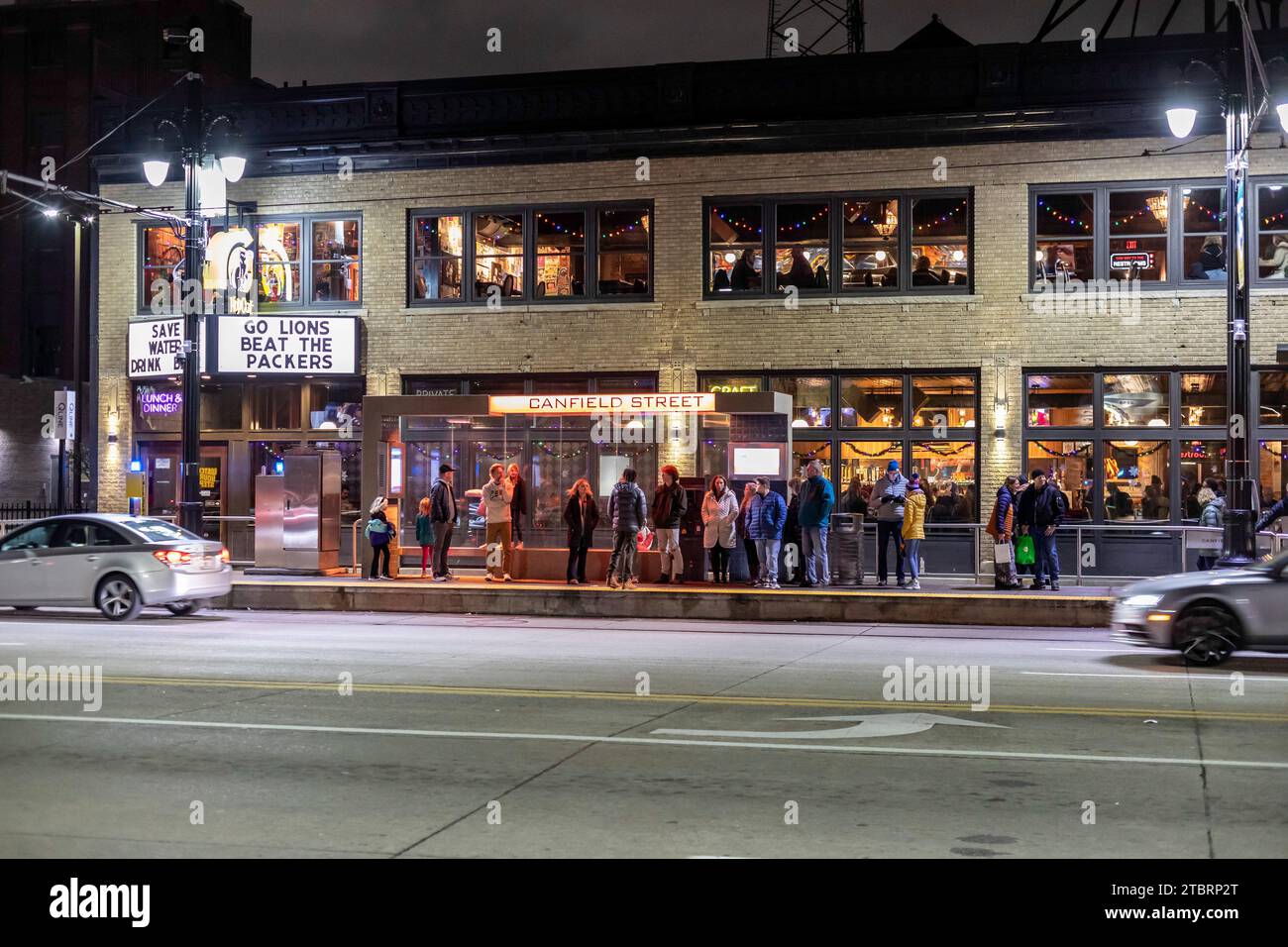 Detroit, Michigan - People wait for the QLine streetcar, which runs in ...