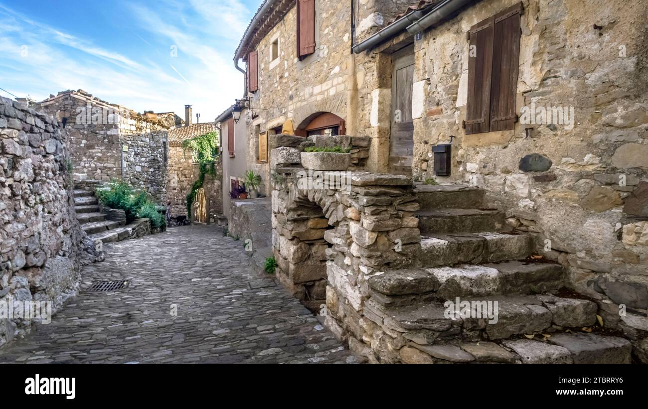 Village alley in Minerve. The medieval village was built on a rock ...