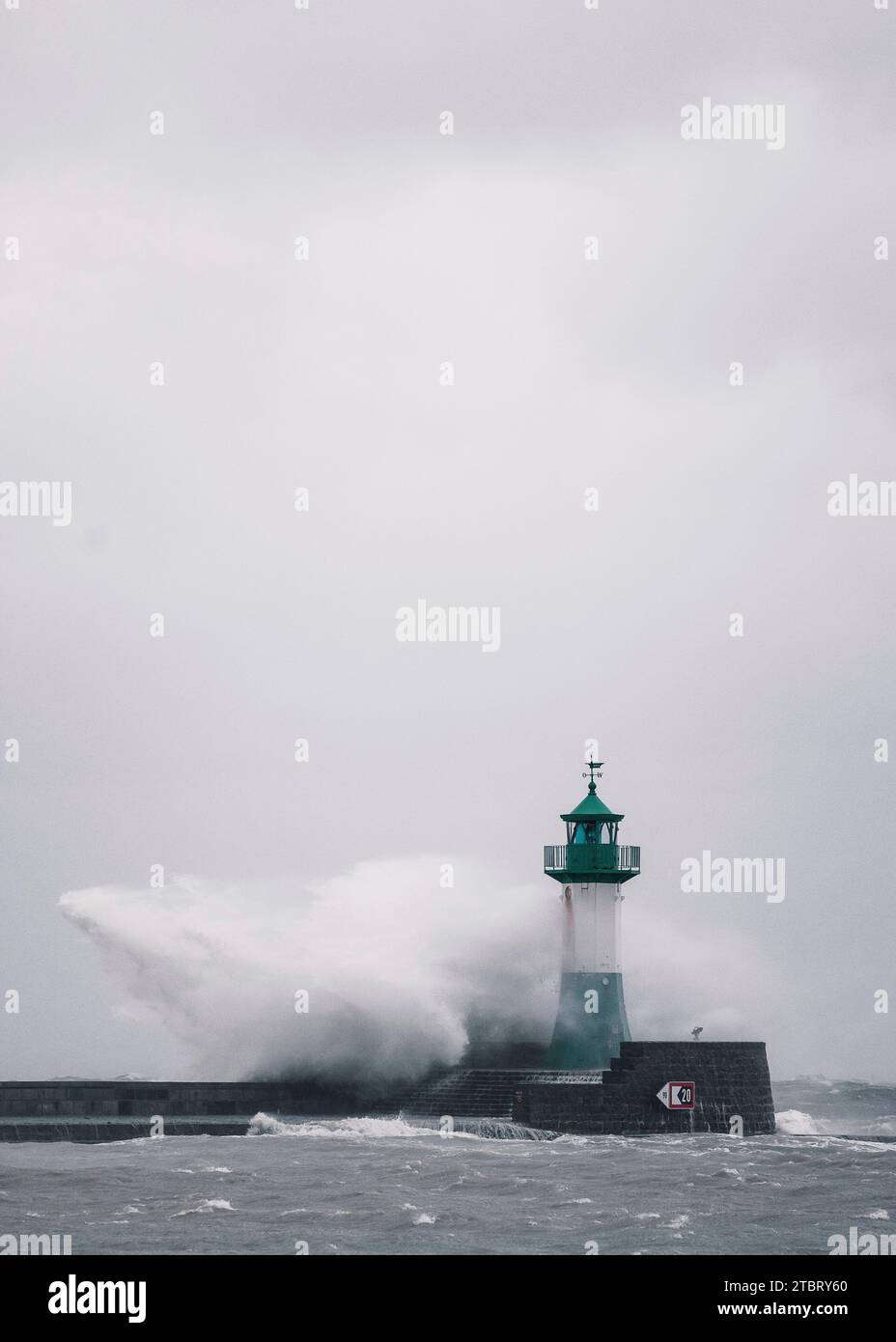 Storm surge with monster wave at the lighthouse in Sassnitz, Rügen ...
