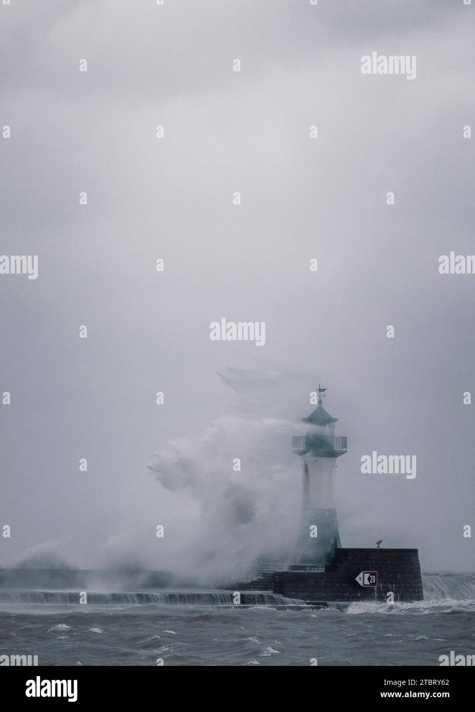 Storm surge with monster wave at the lighthouse in Sassnitz, Rügen ...