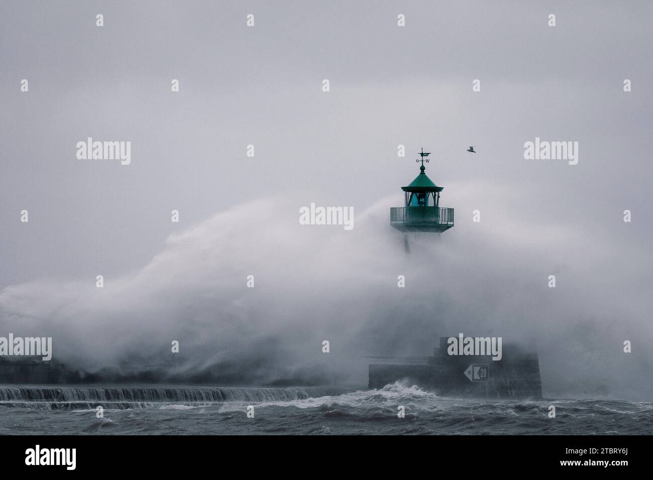 Storm surge with monster wave at the lighthouse in Sassnitz, Rügen ...