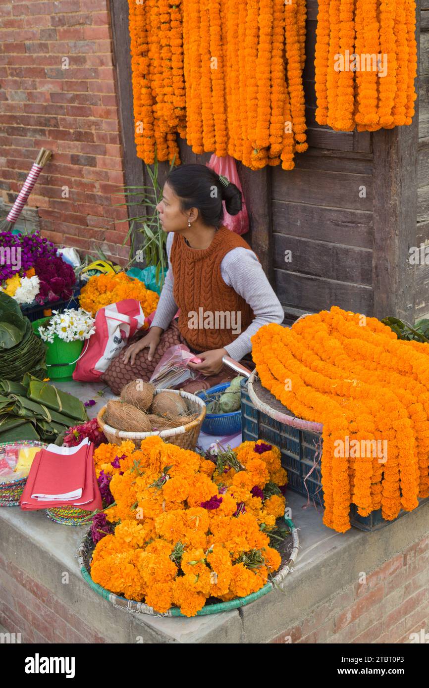 Nepal, Patan, Dashain festival, people, selling flower offerings Stock ...