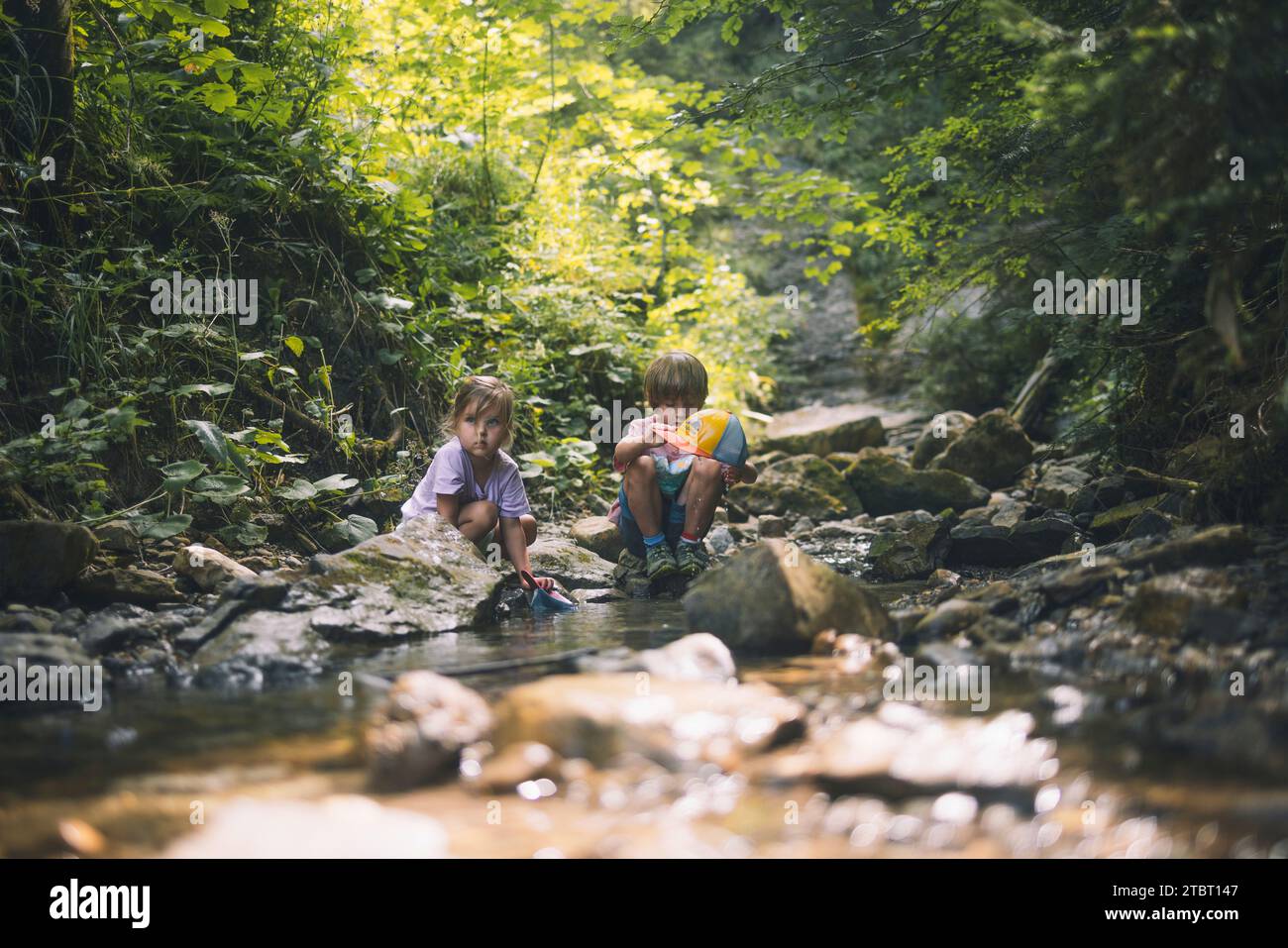 Family hike to the waterfall trail in Nesselwang Stock Photo - Alamy