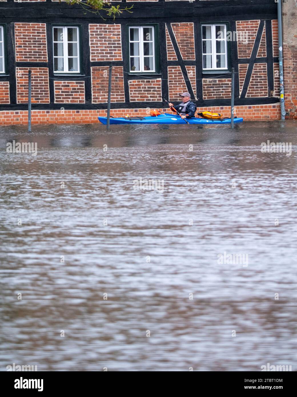 Man in floodwater hi-res stock photography and images - Alamy