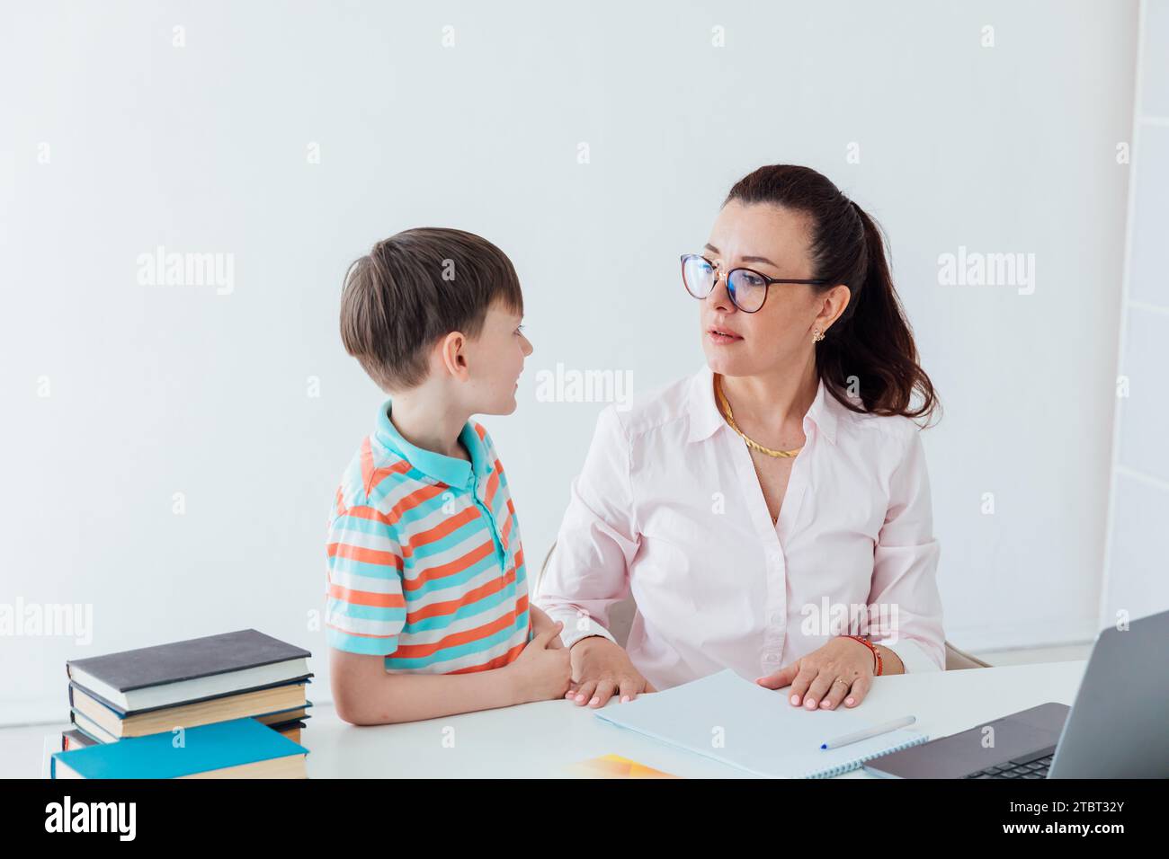 Female accounting boy working on computer online Stock Photo - Alamy