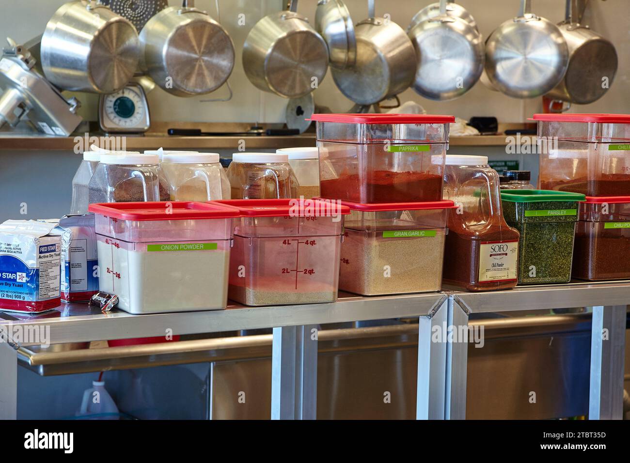 Commercial Kitchen Ingredient Storage and Cookware Setup Stock Photo ...