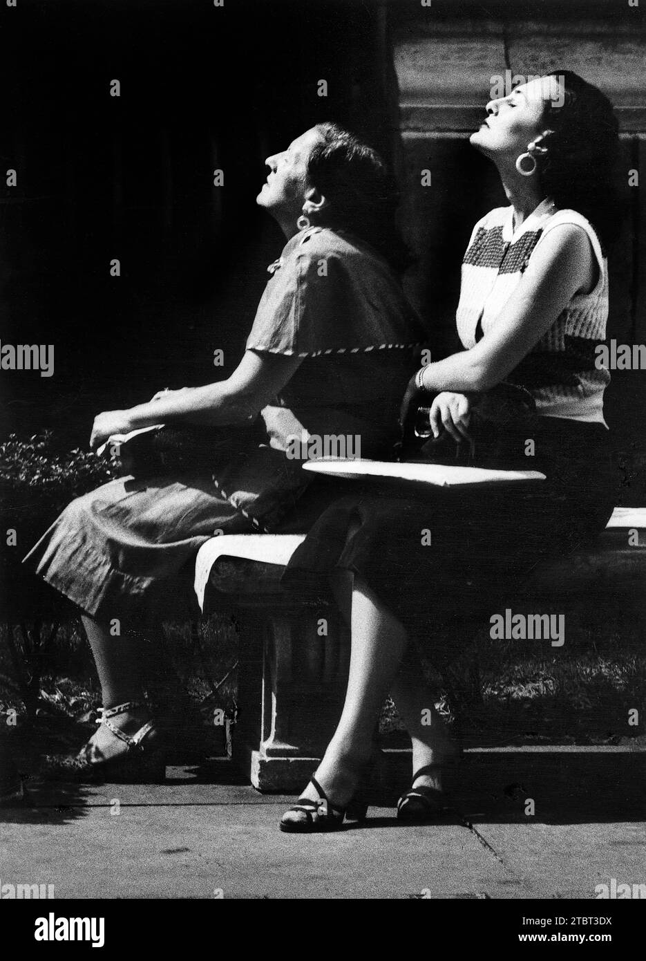Two women sitting in the sun, New York City, New York, USA, Angelo ...
