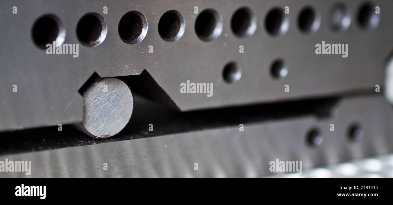 Precision Engineering Metal Peg in Hole Design Close-Up Stock Photo - Alamy