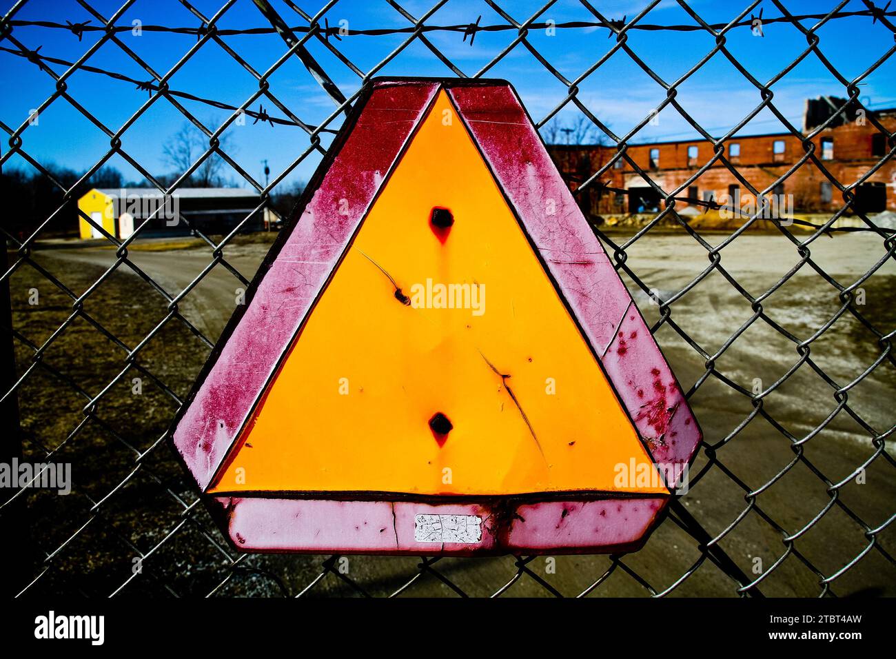 Weathered Warning Sign on Chain-link Fence in Industrial Setting Stock ...