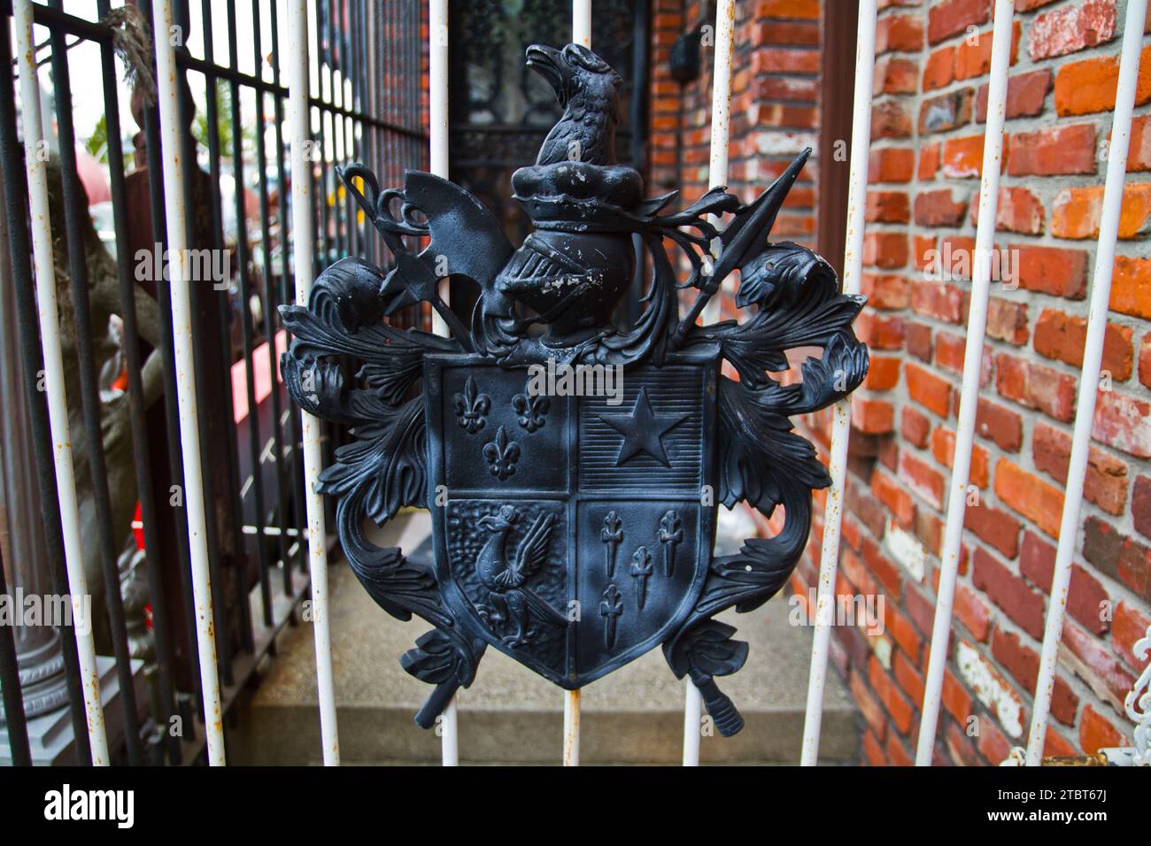 Daylight View of Black Metal Crest on White Gate, Louisville Stock ...