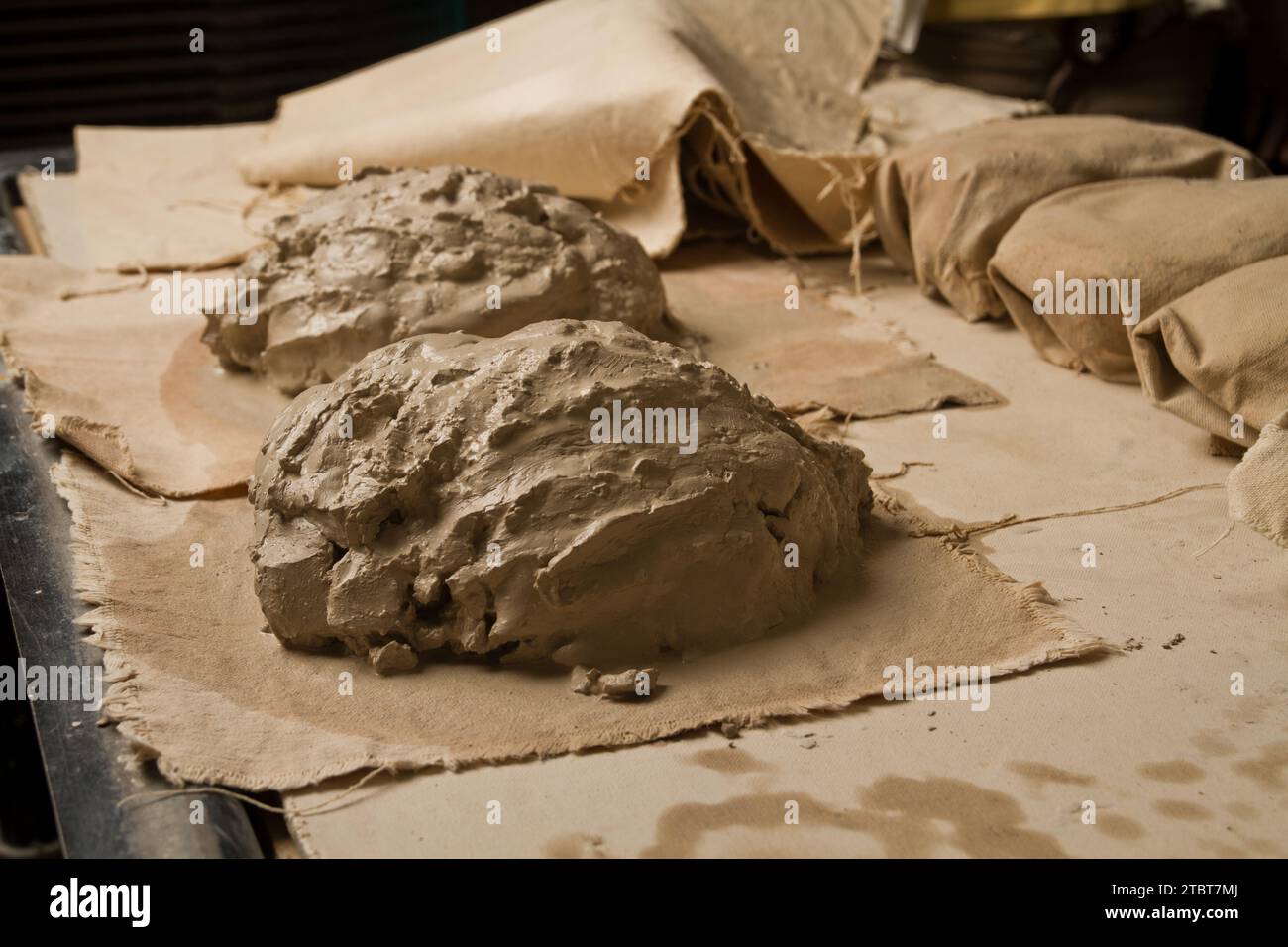 Wet Clay on Canvas in Artisan Pottery Studio Stock Photo - Alamy