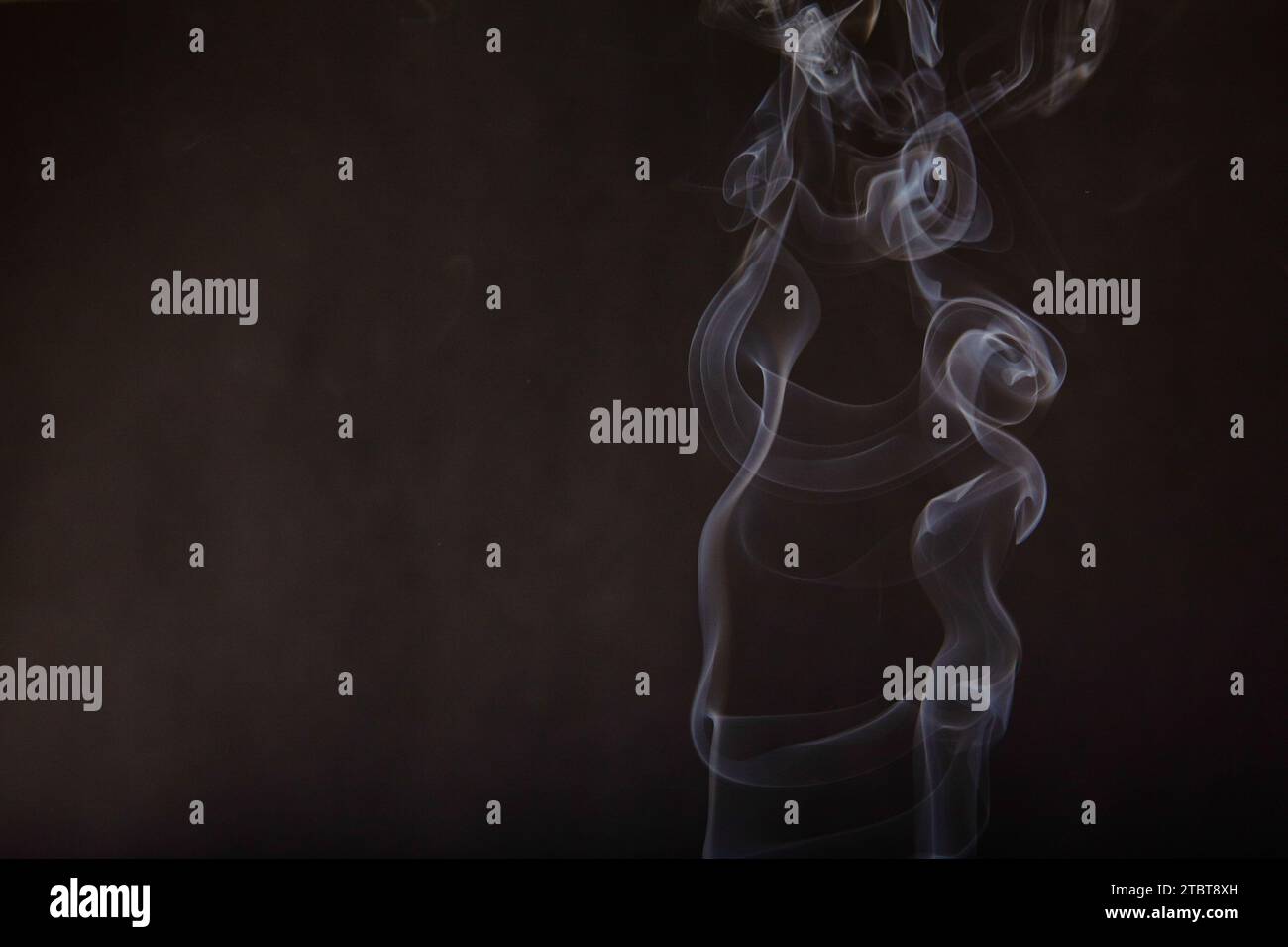 Ethereal Incense Smoke Dance in High-Speed Capture Stock Photo - Alamy