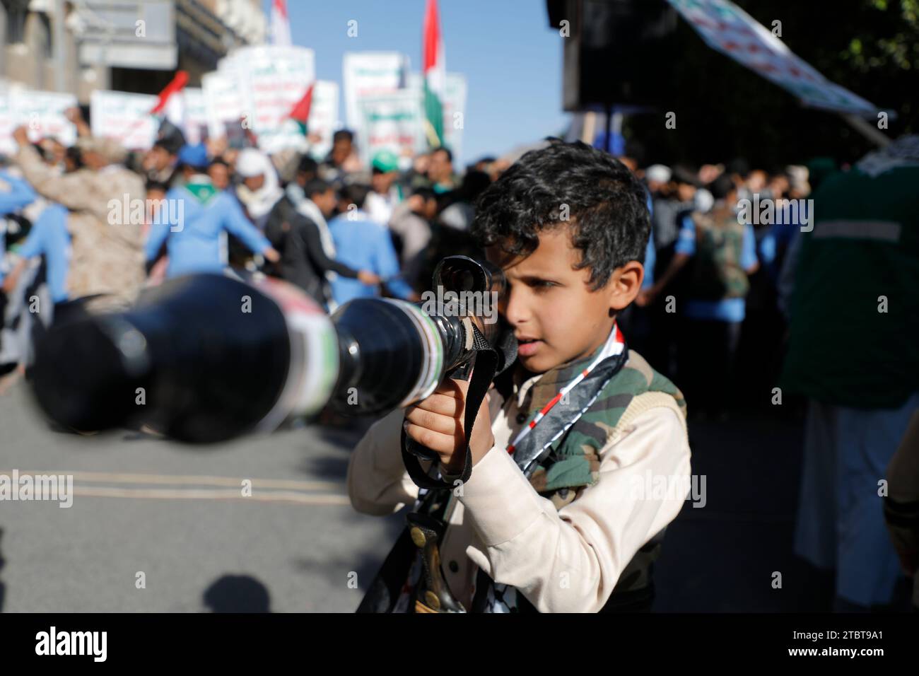 Sanaa, Yemen. 8th Dec, 2023. A boy holds an mock RPG know the ''Al ...