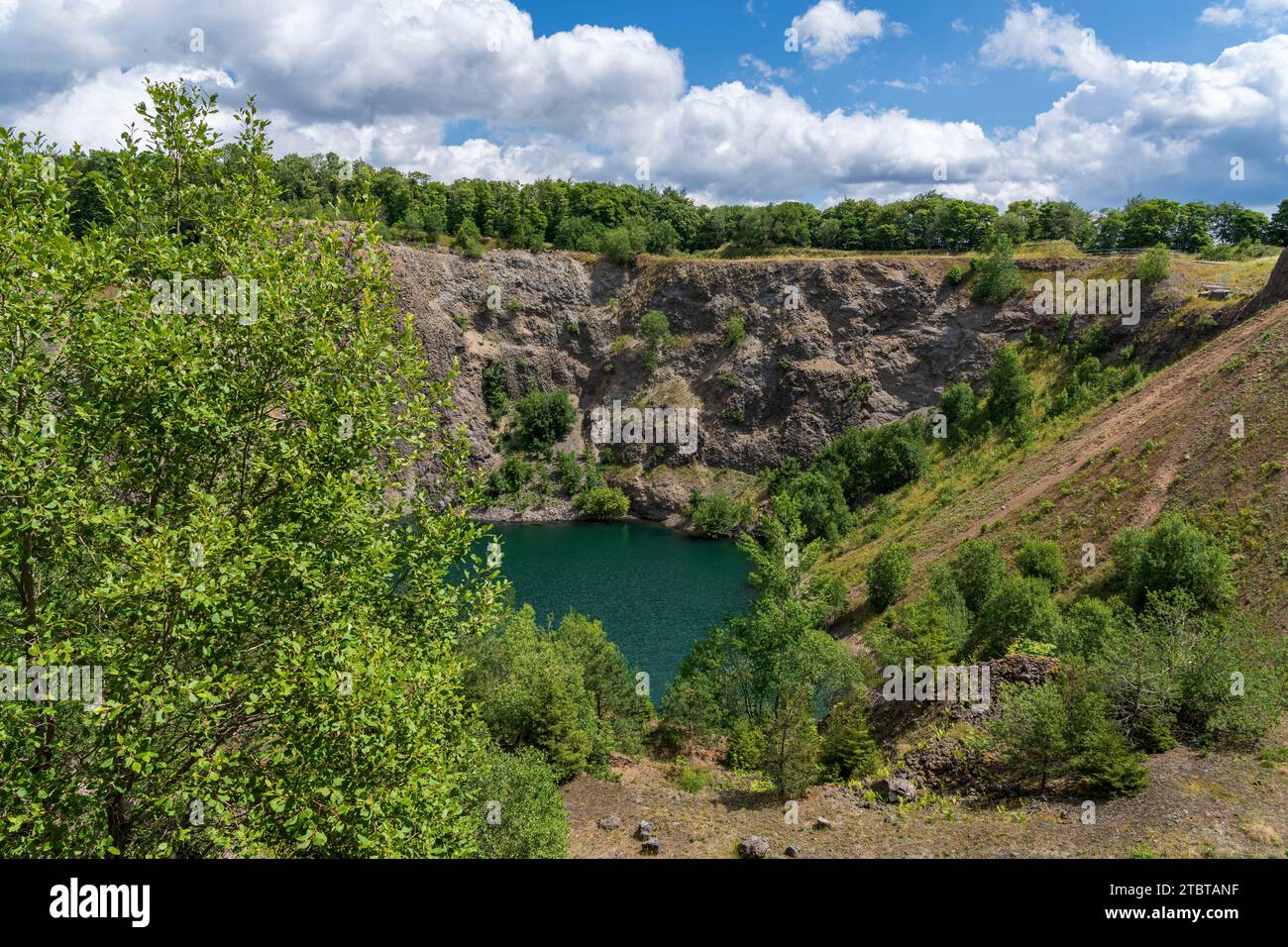 Former basalt quarry in the Schwarze Berge nature reserve near the ...