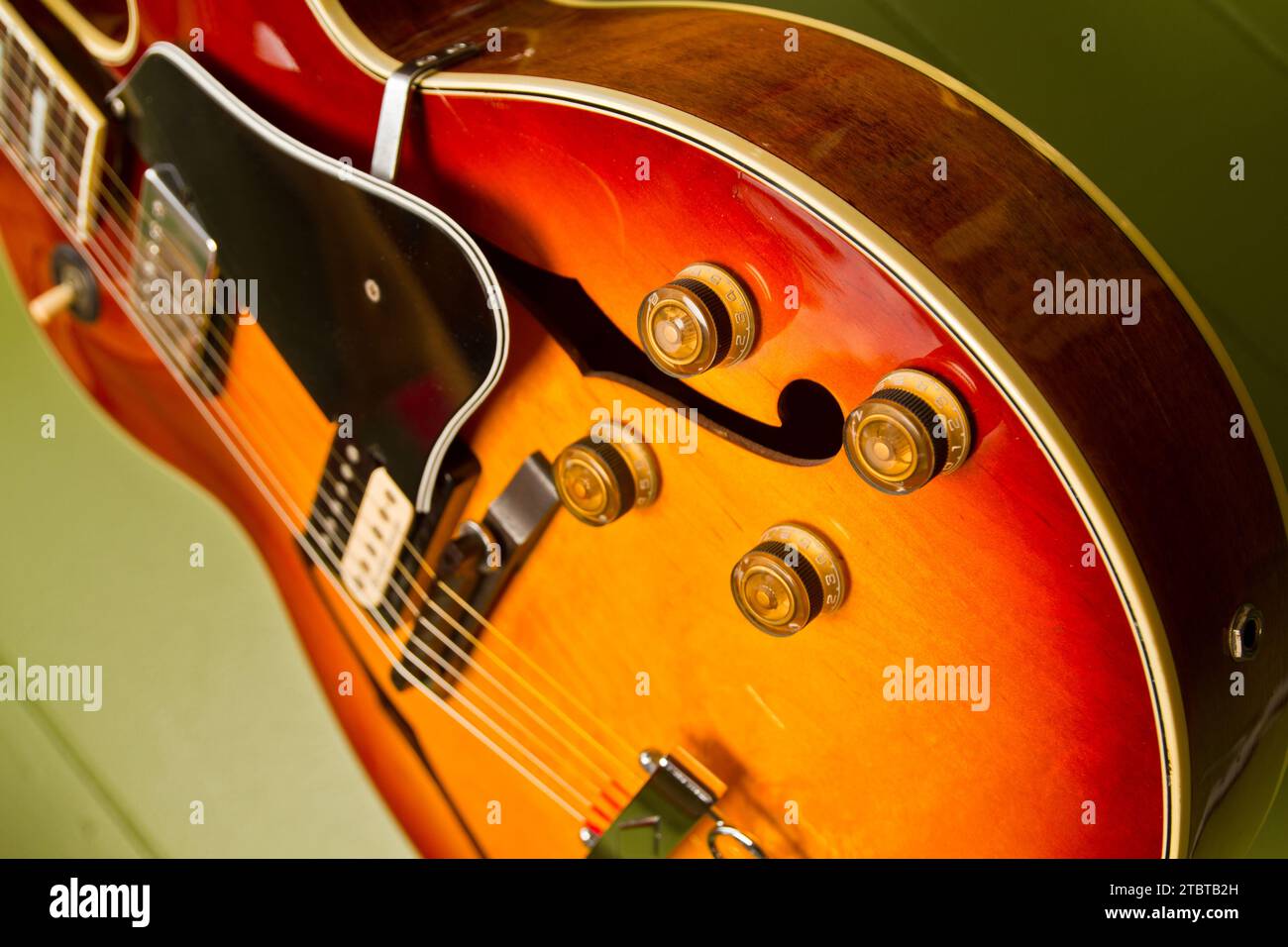 Close-up Sunburst Electric Guitar in Warm Natural Light Stock Photo - Alamy