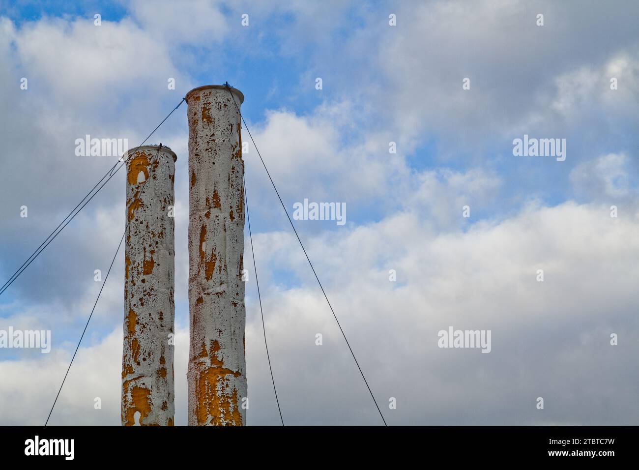 Rustic Industrial Towers Against Dynamic Sky in Warsaw, Indiana Stock ...