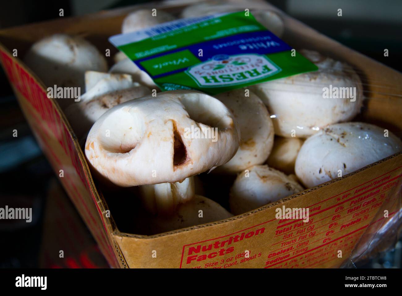 Skull Carved White Mushrooms in Grocery Store with Nutrition Label ...