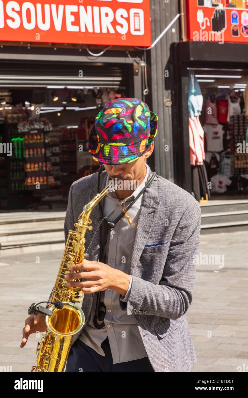 Playing saxophone hi-res stock photography and images - Alamy
