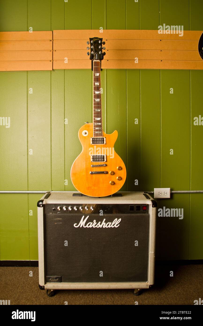 Sunburst Electric Guitar and Amplifier in Casual Studio Setting Stock ...