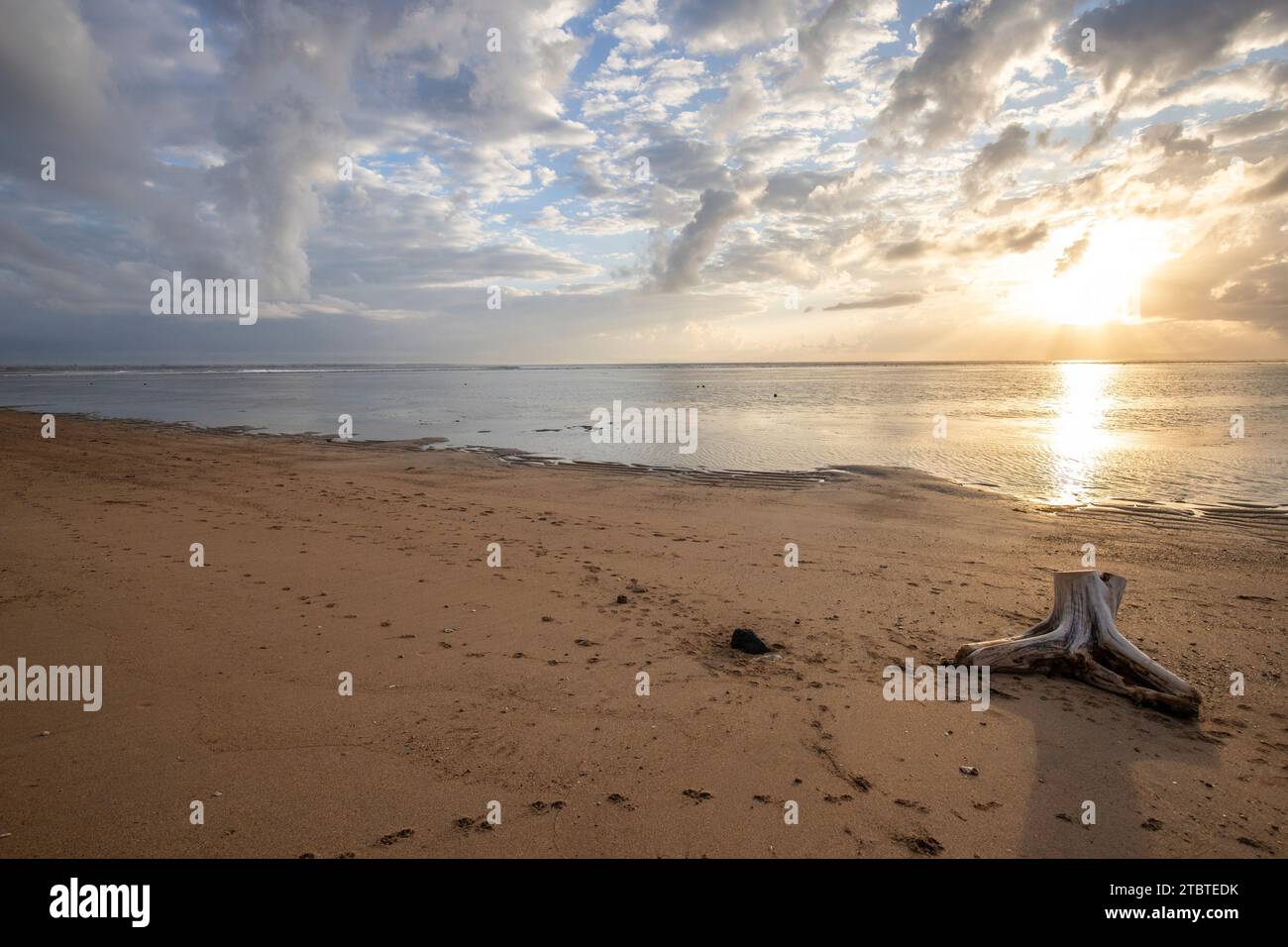 Sunrise on sandy beach, landscape shot with view of the sea and the ...