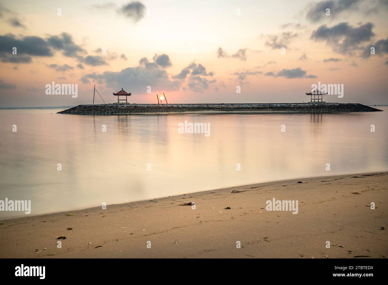 Sunrise over the sea, view from the sandy beach to the horizon, in the ...