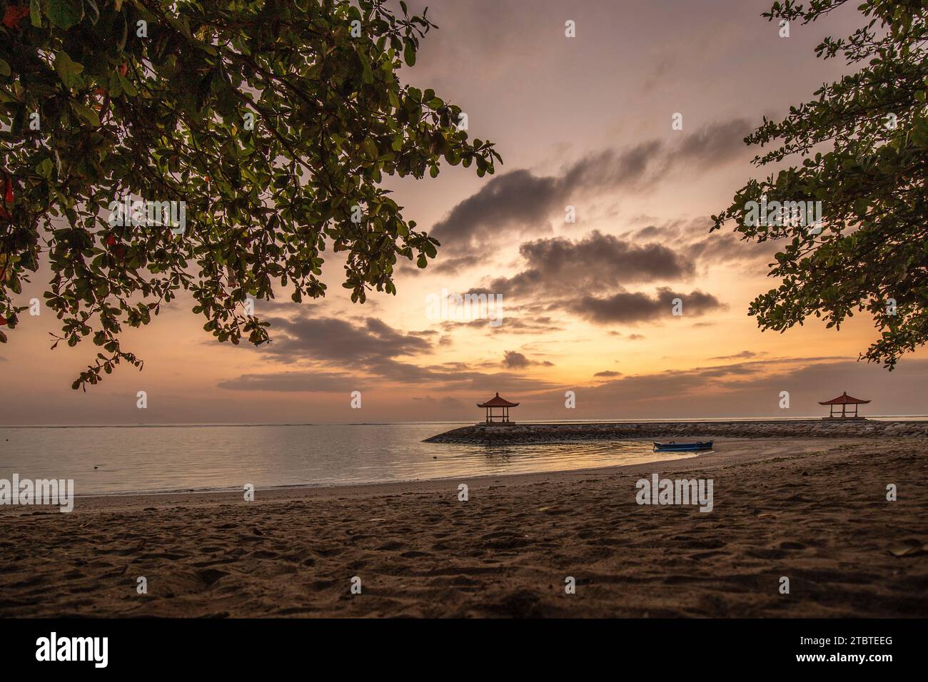 Sunrise over the sea, view from the sandy beach to the horizon, in the ...