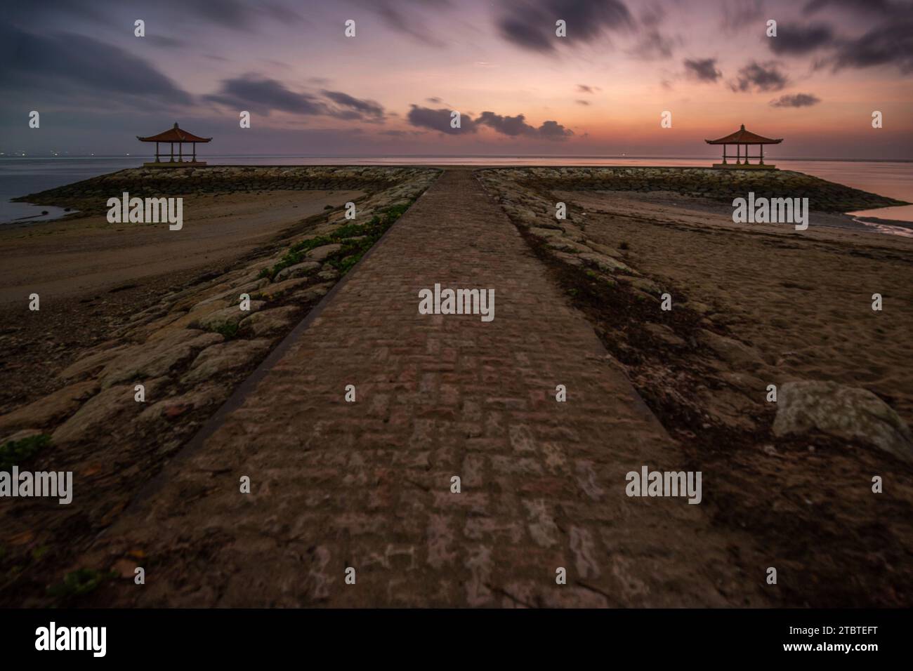 Sunrise over the sea, view from the sandy beach to the horizon, in the ...