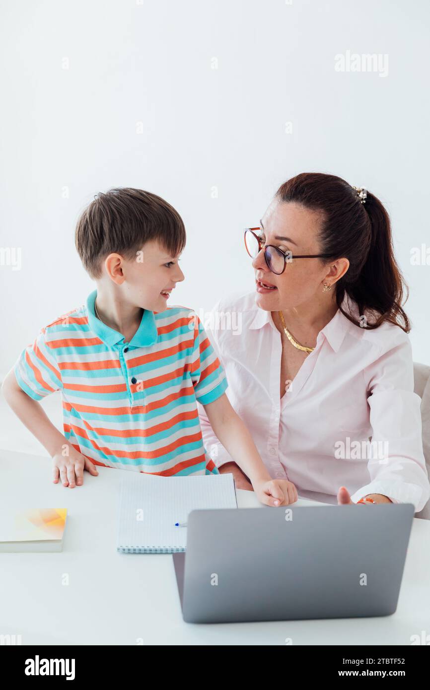 Female accounting boy working on computer online Stock Photo - Alamy