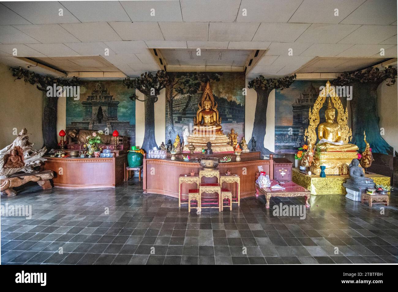 A Buddhist temple in the evening in the rain, the Brahmavihara-Arama temple has beautiful ...