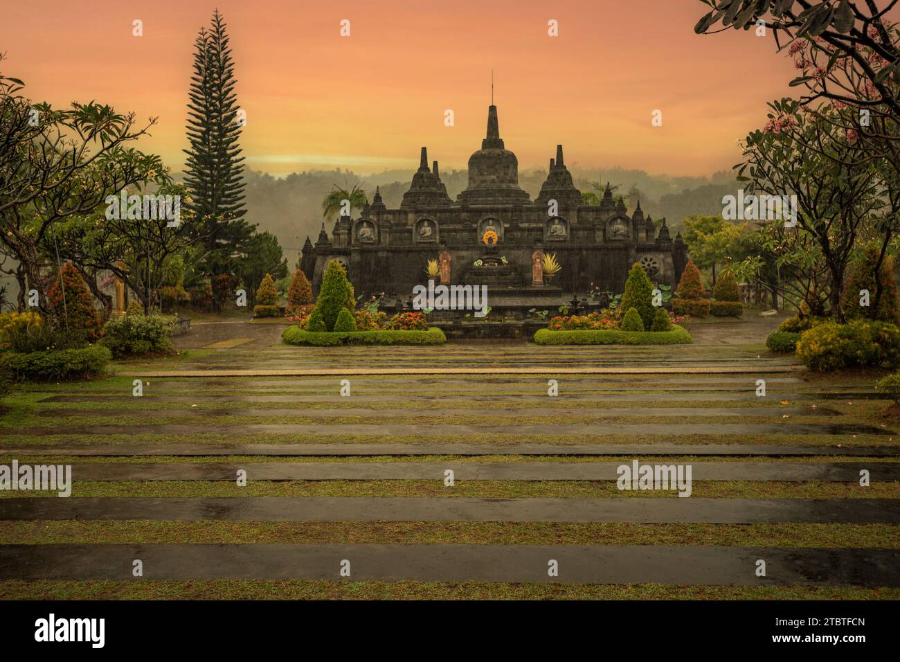 A Buddhist temple in the evening in the rain, the Brahmavihara-Arama temple has beautiful ...