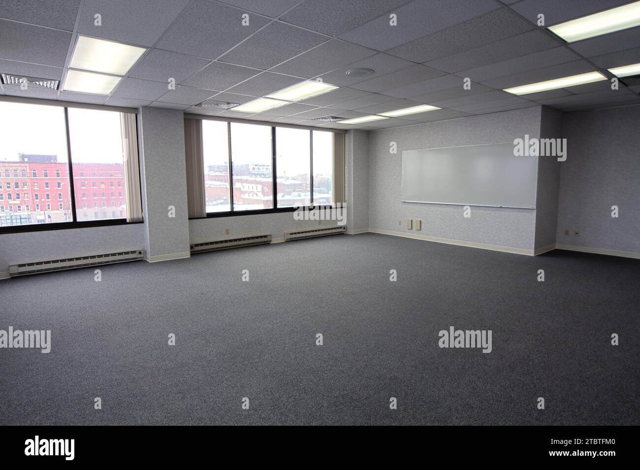 Spacious Empty Office Space with Urban View and Brainstorming Potential ...