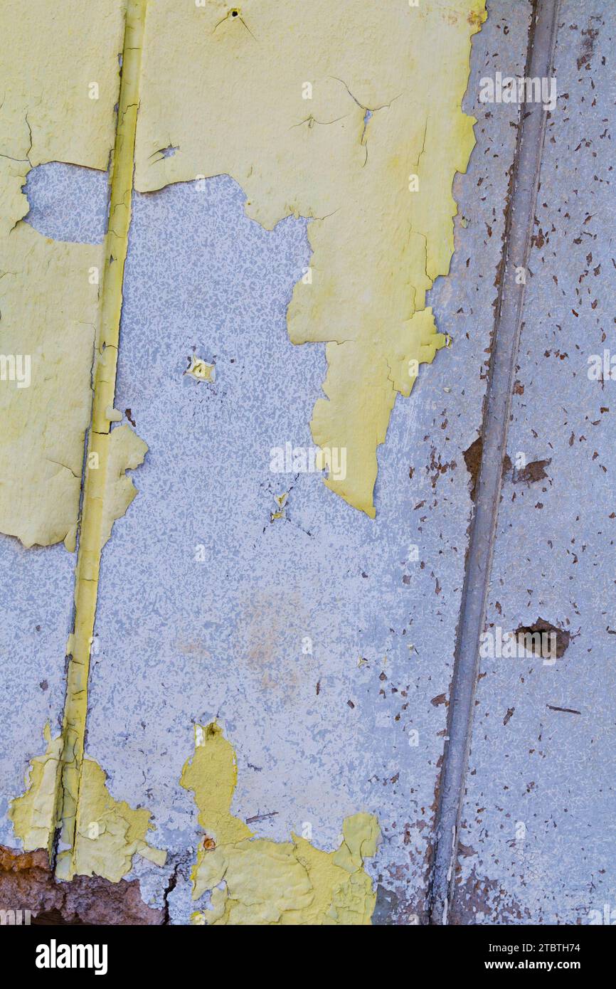 Close Up of Aged Yellow Paint Peeling on Industrial Wall in St. Louis ...