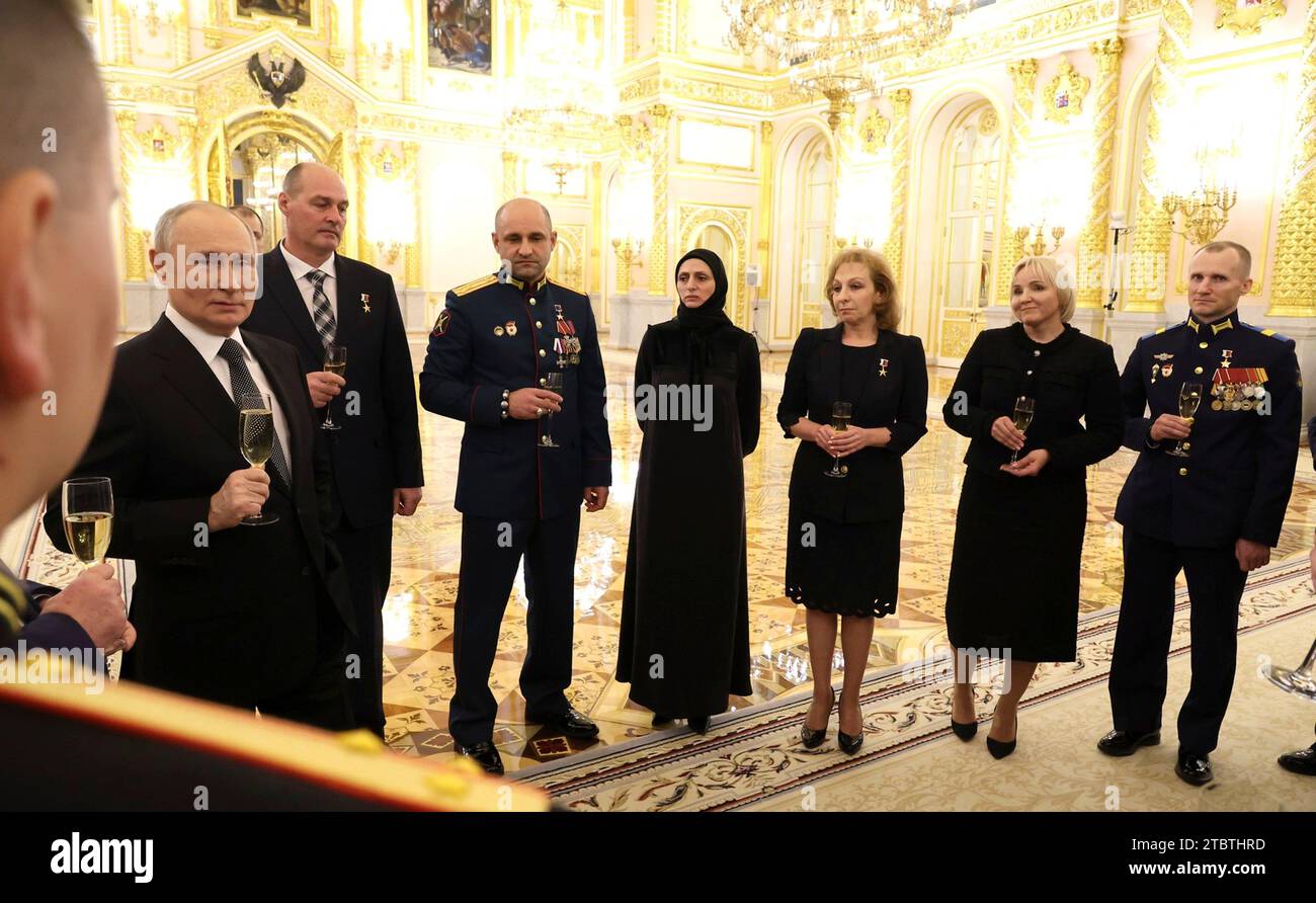 Moscow, Russia. 08th Dec, 2023. Russian President Vladimir Putin, left ...